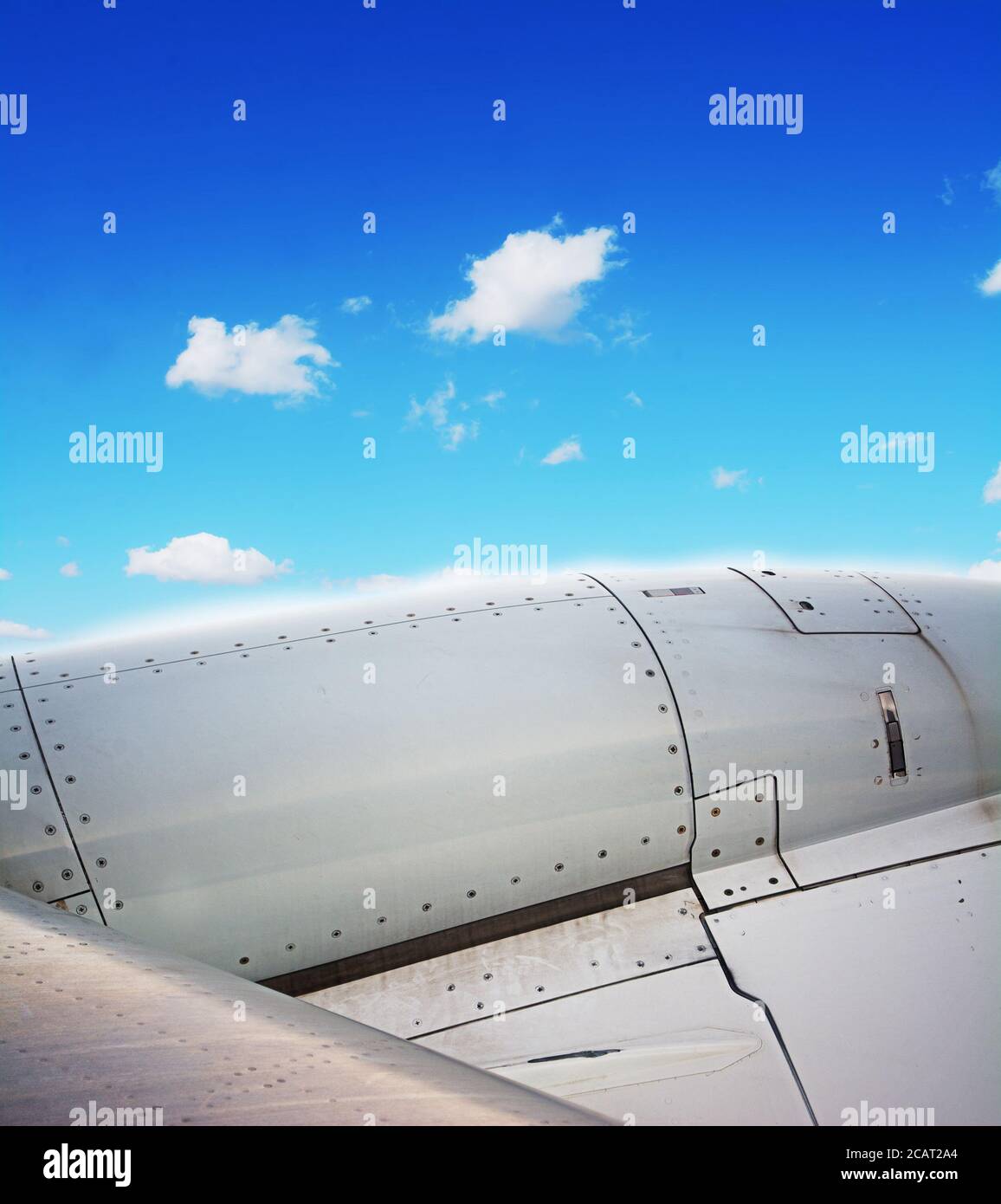 airplane engine in a cloudy sky Stock Photo - Alamy