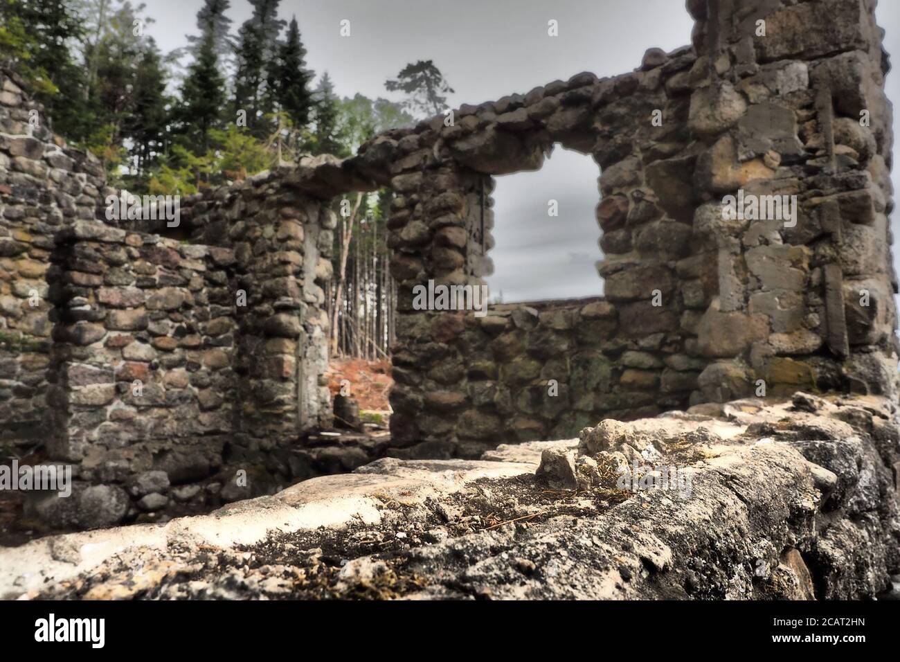 Beautiful shot of 100-year-old ruins of a stone lodge Stock Photo - Alamy
