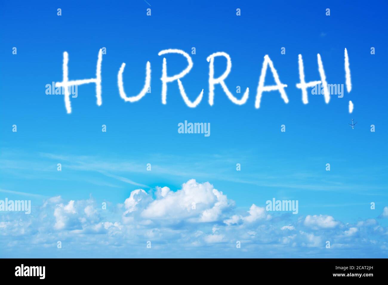hurrah written in the sky with an airplane contrail Stock Photo - Alamy