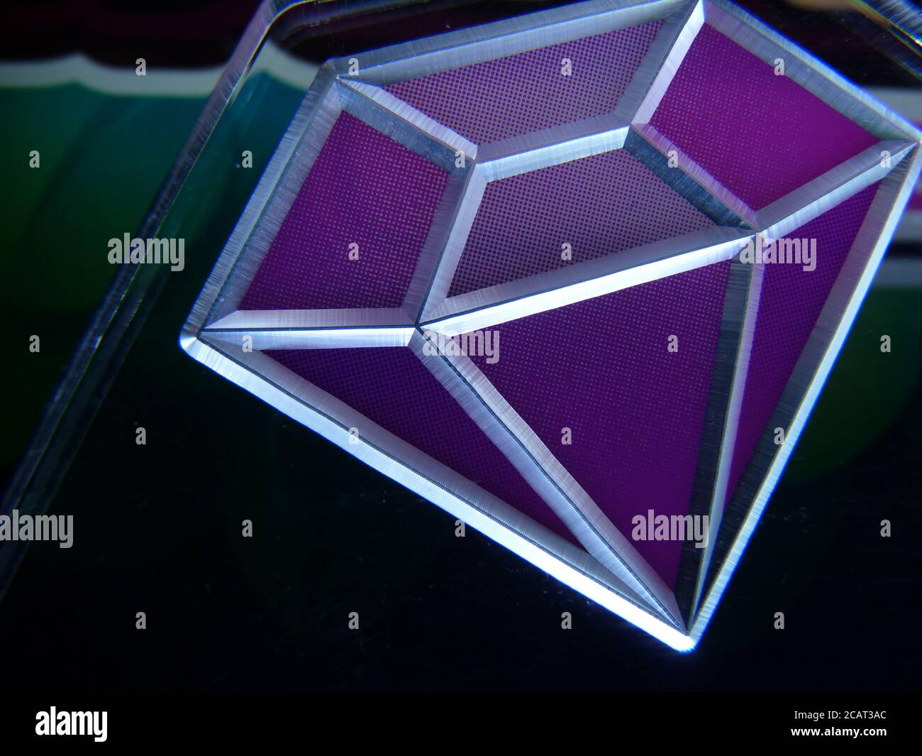 Diamond shape metal hologram filled with violet color Stock Photo - Alamy