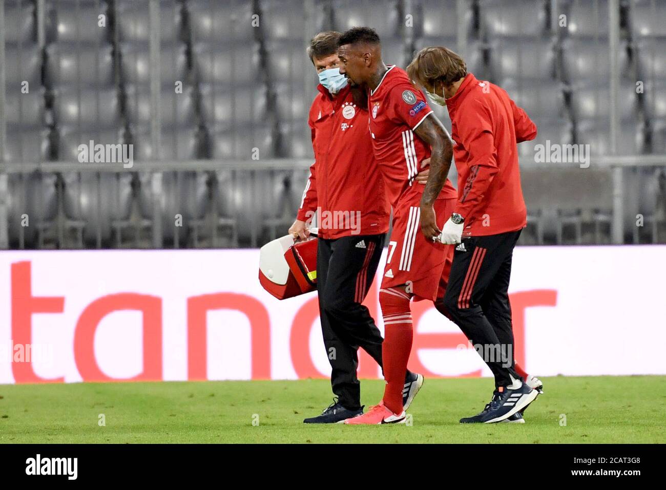 Munich's Jerome Boateng leaves the pitch with an injury during the UEFA ...
