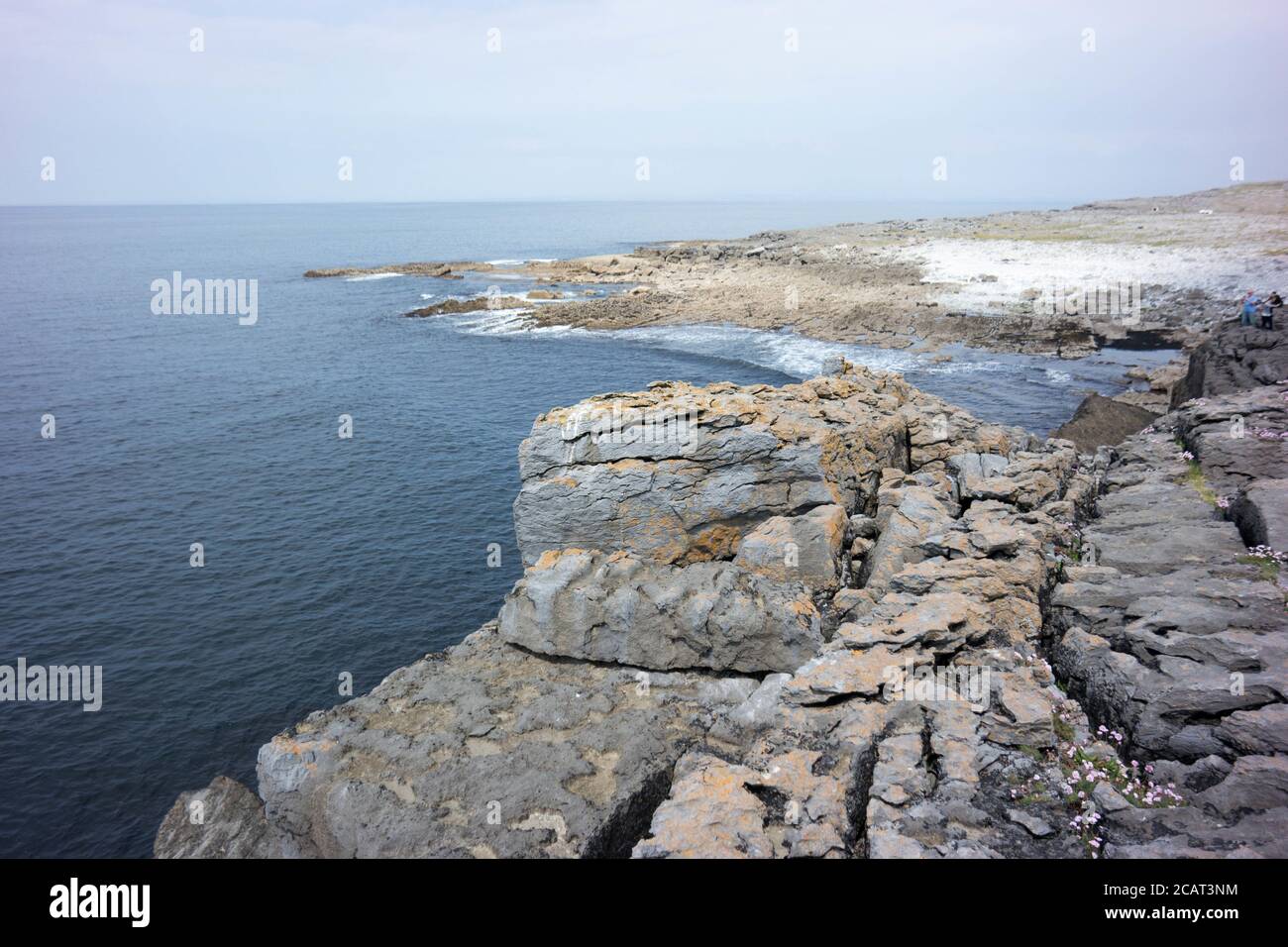 Ocean waves hitting the high rocky cliffs Stock Photo - Alamy