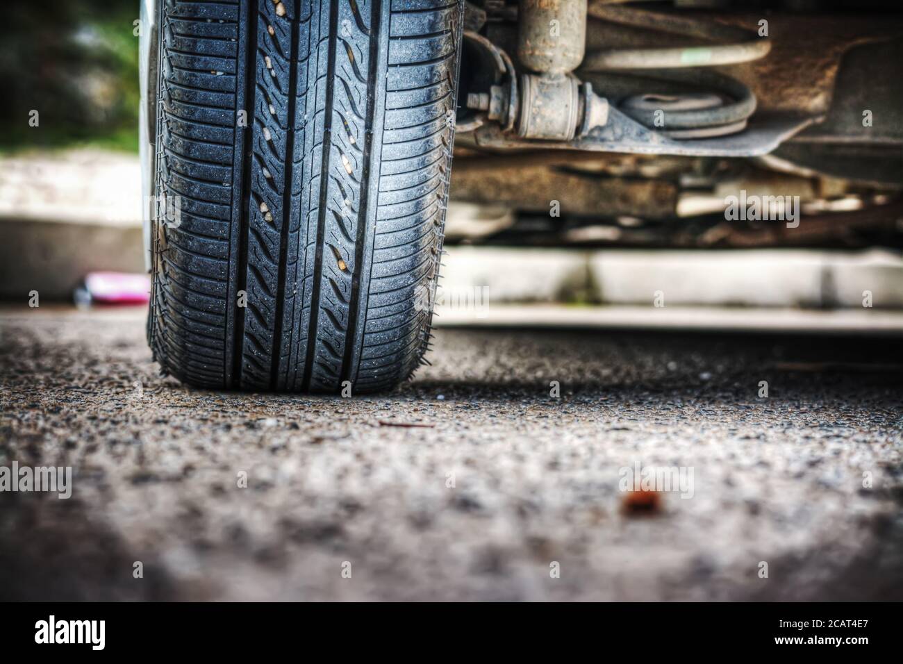 car wheel on the ground seen from behind Stock Photo - Alamy
