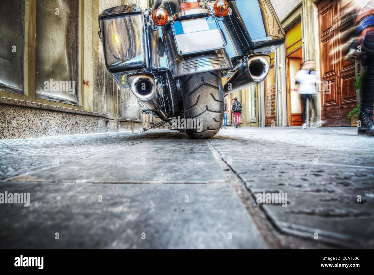 close up of a classic motorcycle wheel seen from the ground in hdr ...
