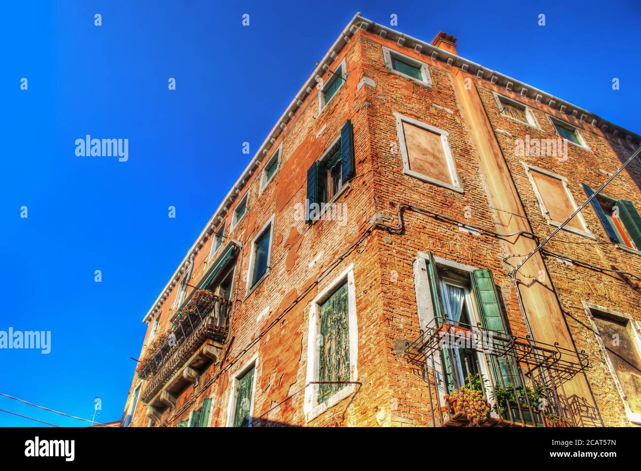 orange building with brick facades in Venice, Italy Stock Photo - Alamy