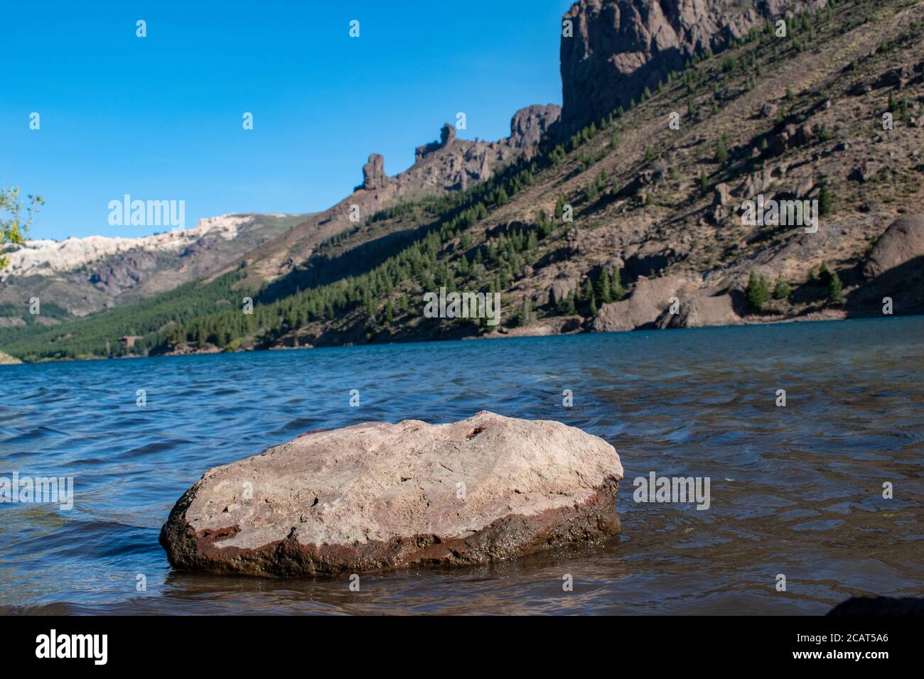 rock in the lake Stock Photo - Alamy