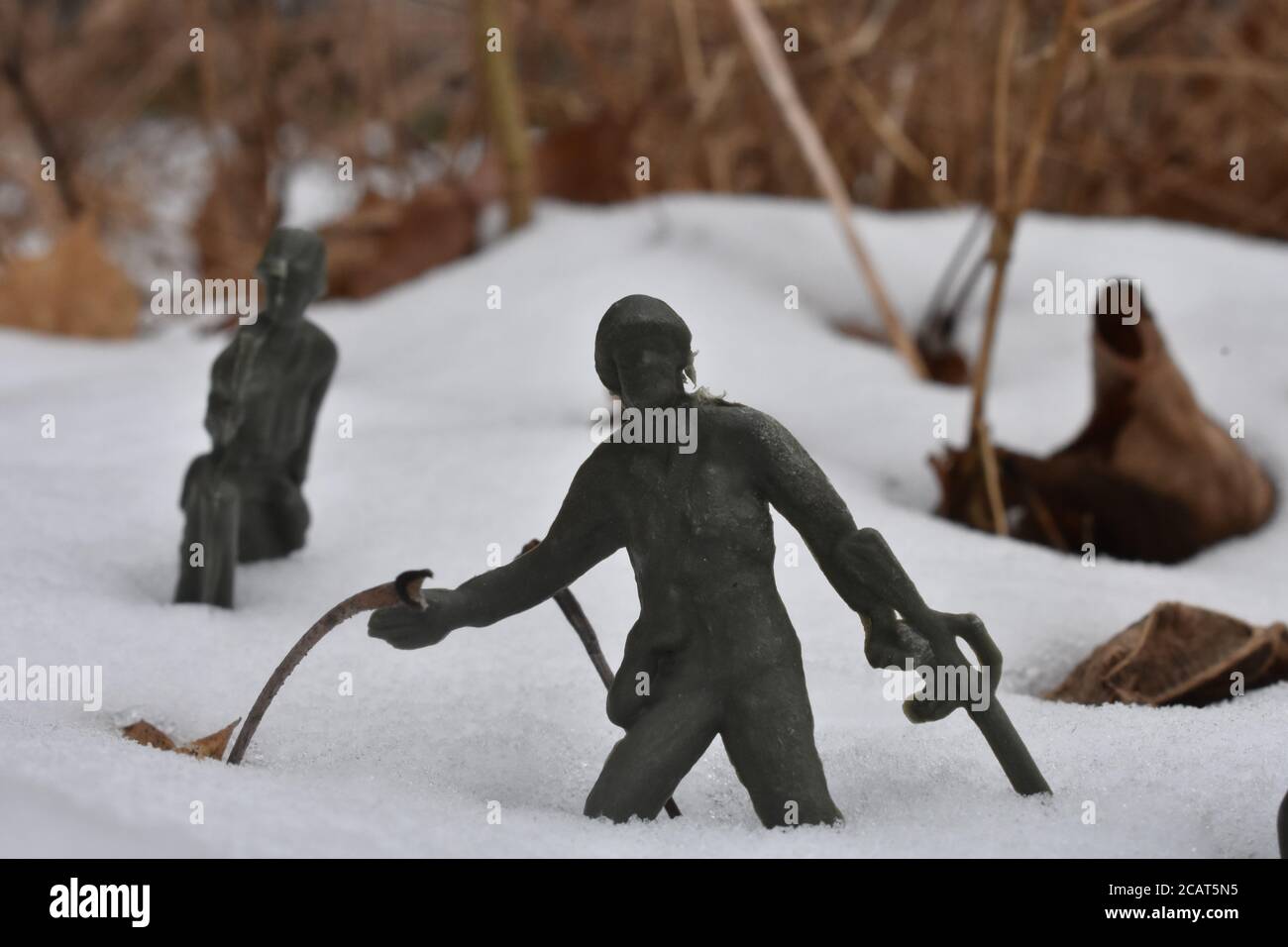 A Toy Soldier Leaning Back to Throw a Grenade in Knee-Deep Snow Stock ...