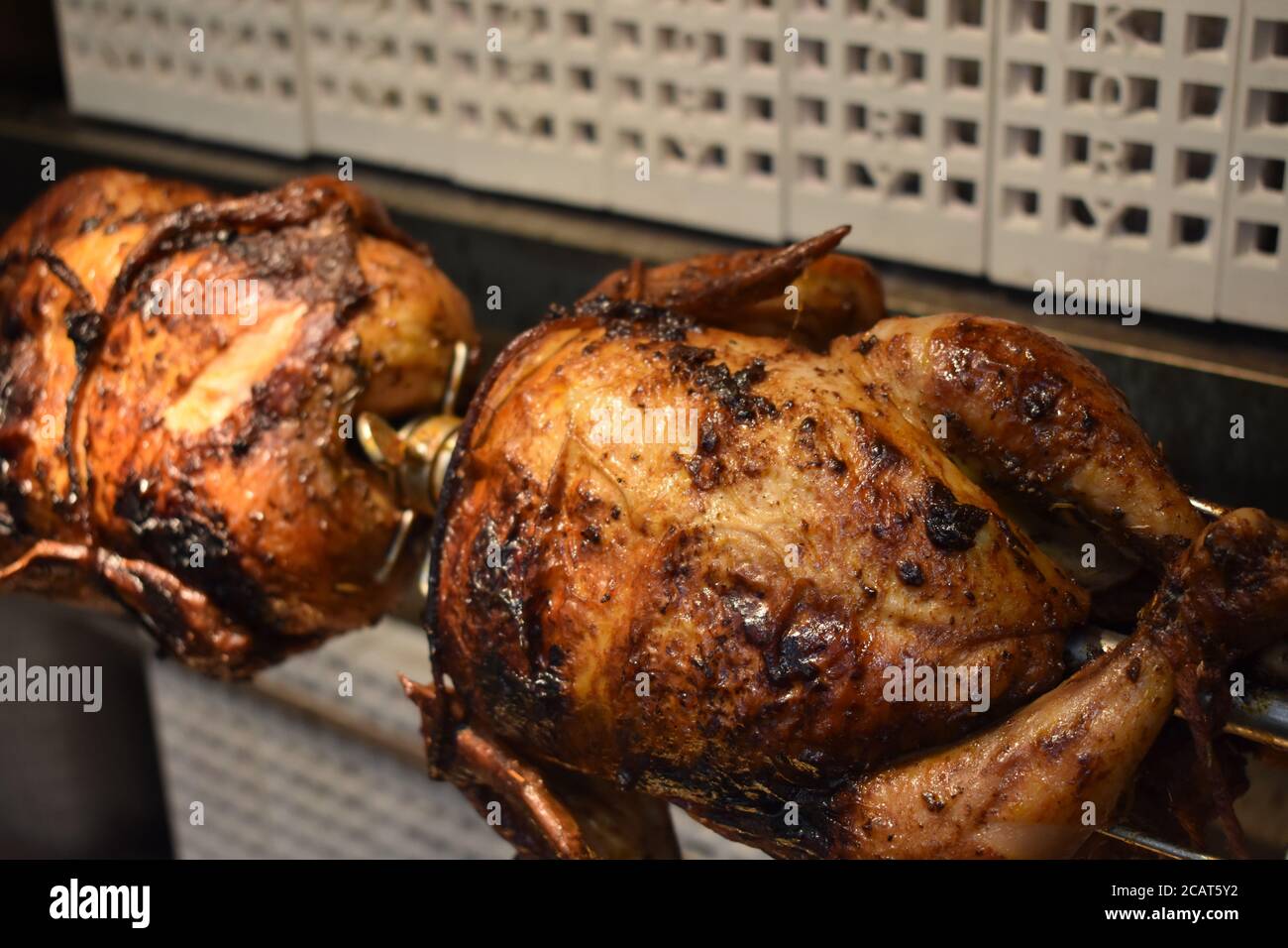 Fresh Cooked Rotisserie Chicken Still Rotating Inside the Rotisserie ...