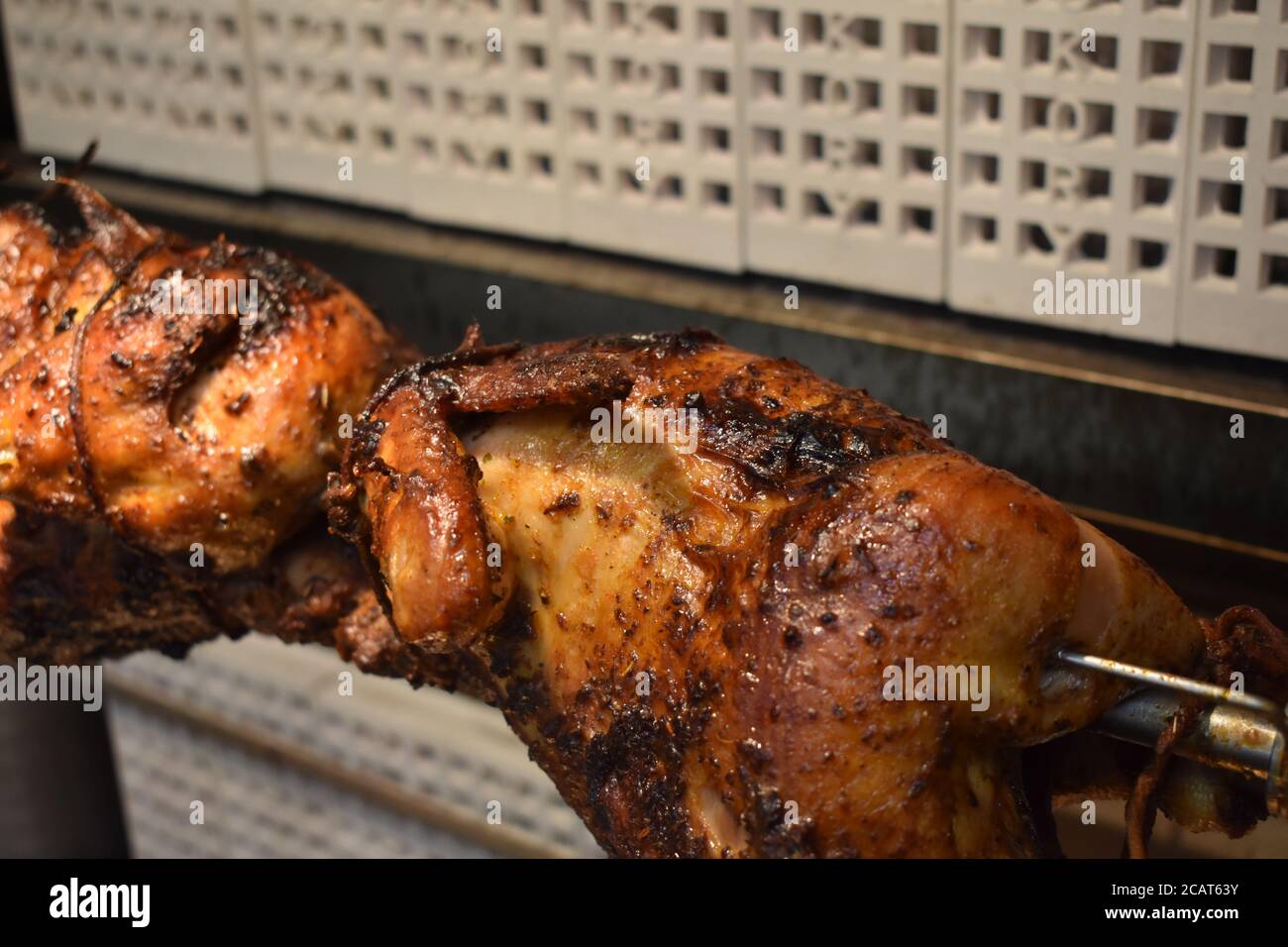Fresh Cooked Rotisserie Chicken Still Rotating Inside the Rotisserie ...