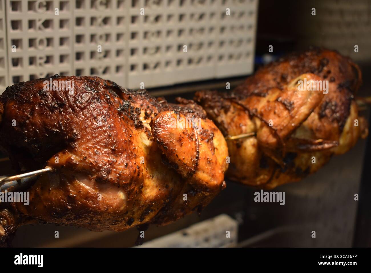 Fresh Cooked Rotisserie Chicken Still Rotating Inside the Rotisserie ...
