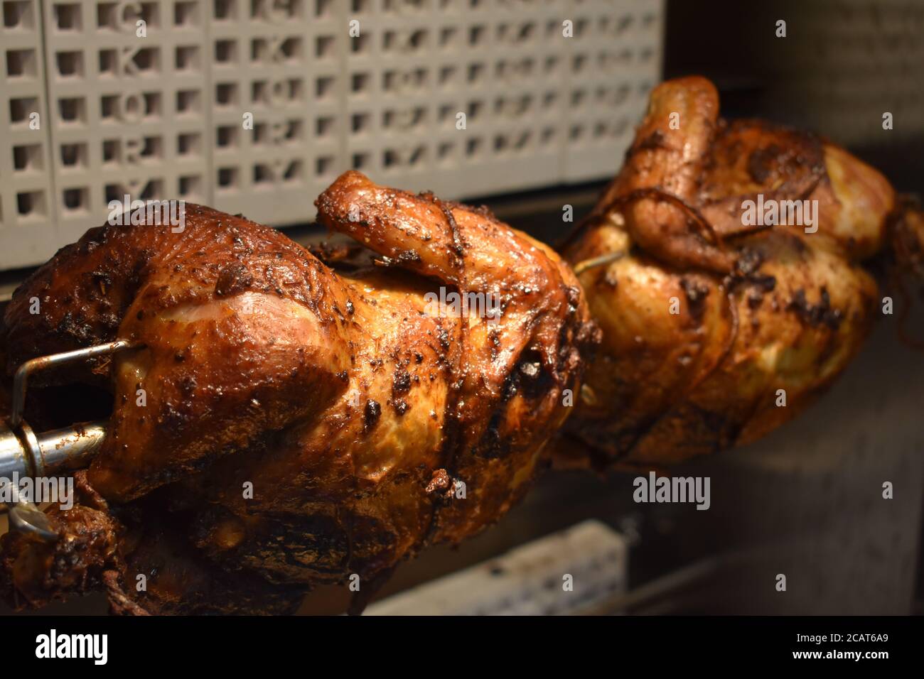 Fresh Cooked Rotisserie Chicken Still Rotating Inside the Rotisserie ...