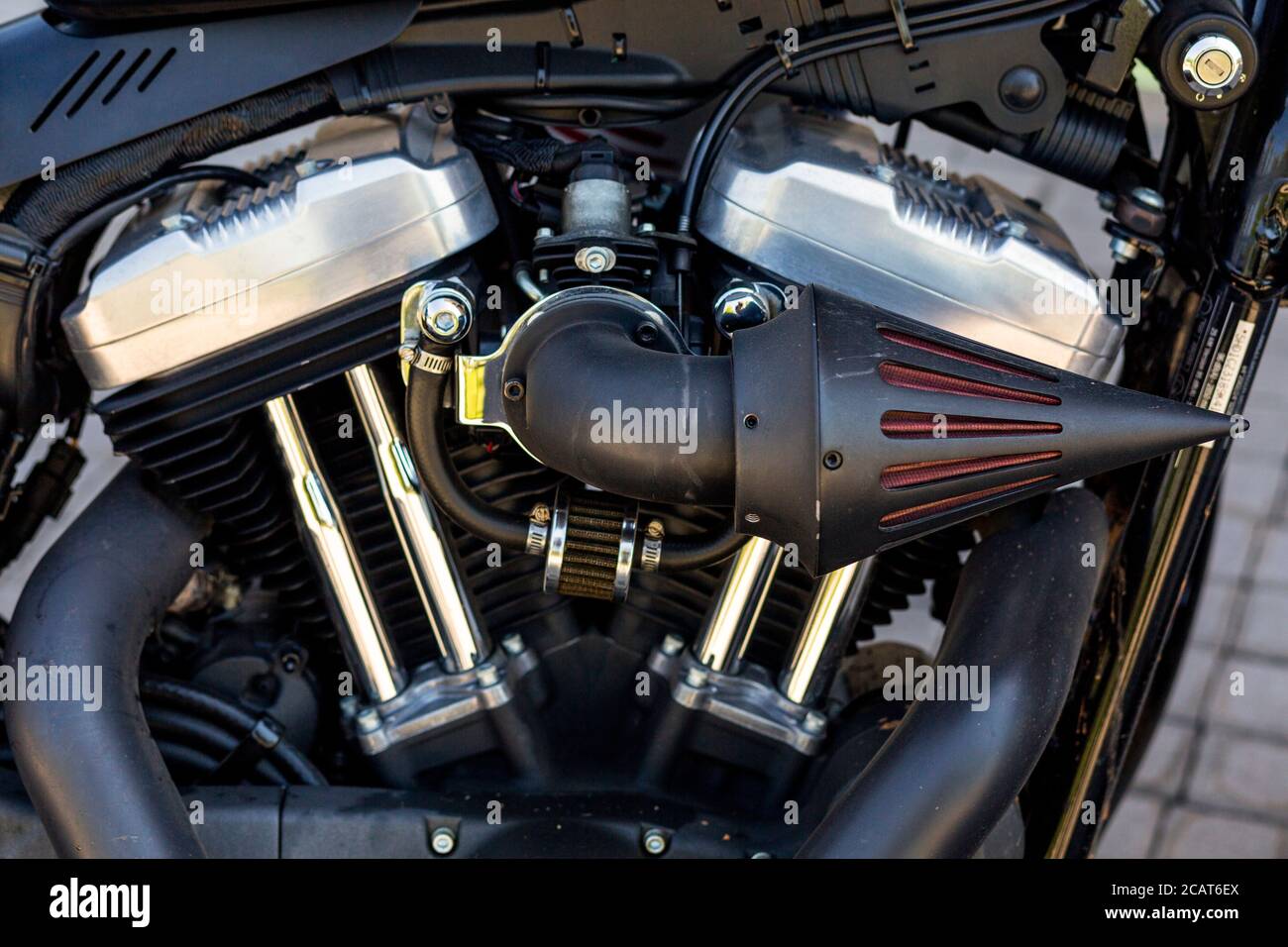 Motorcycle engine chrome plated and strong appearing Stock Photo - Alamy