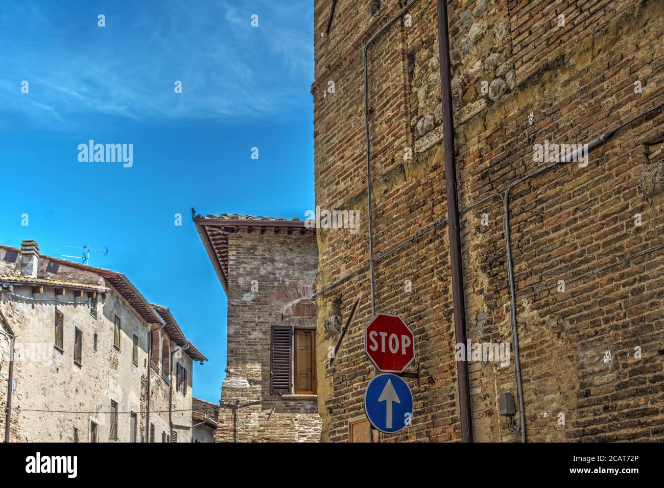 stop sign in a picturesque small town in Tuscany, Italy Stock Photo - Alamy