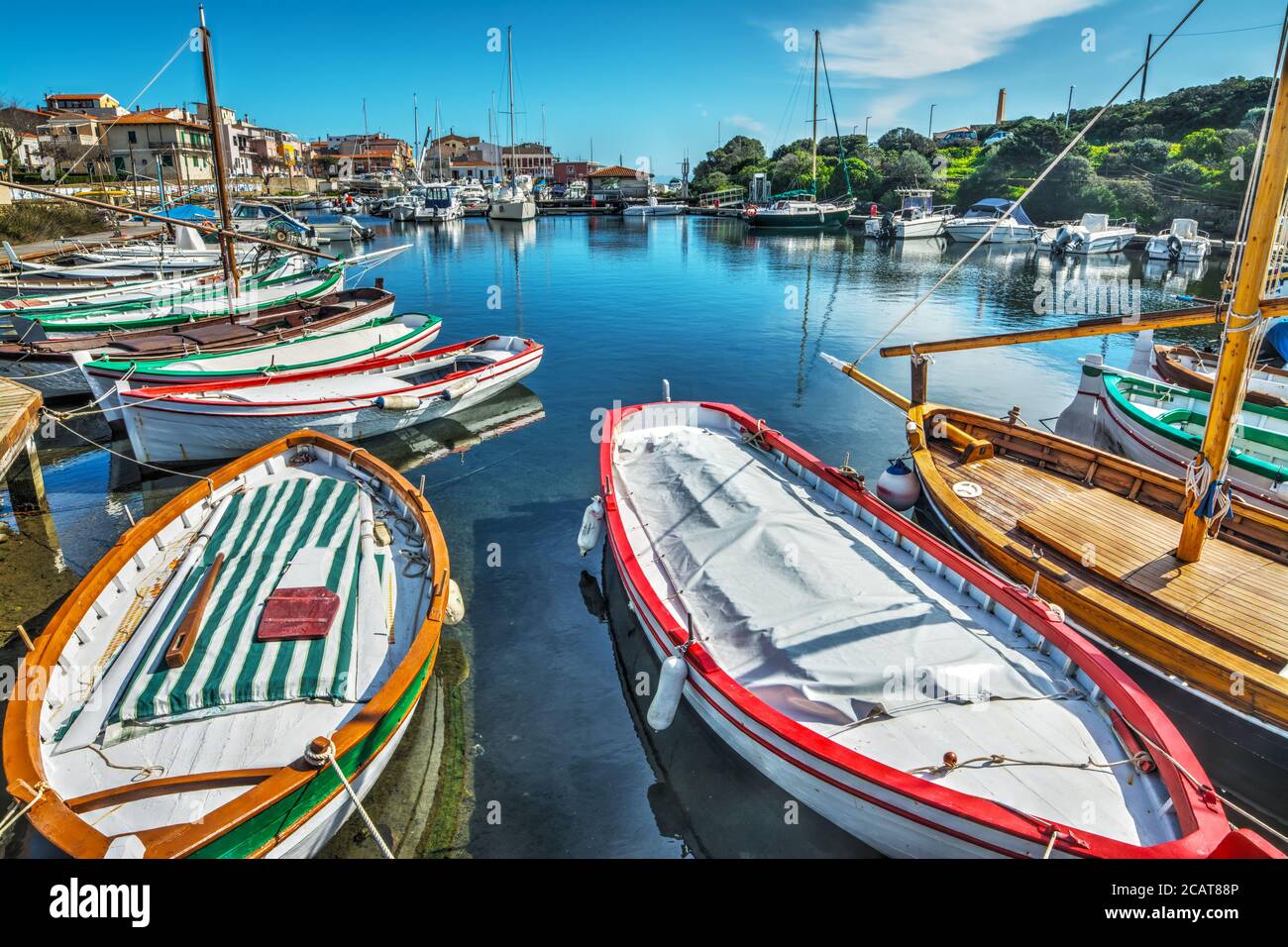 wooden boat in Stintino harbor, Italy Stock Photo - Alamy