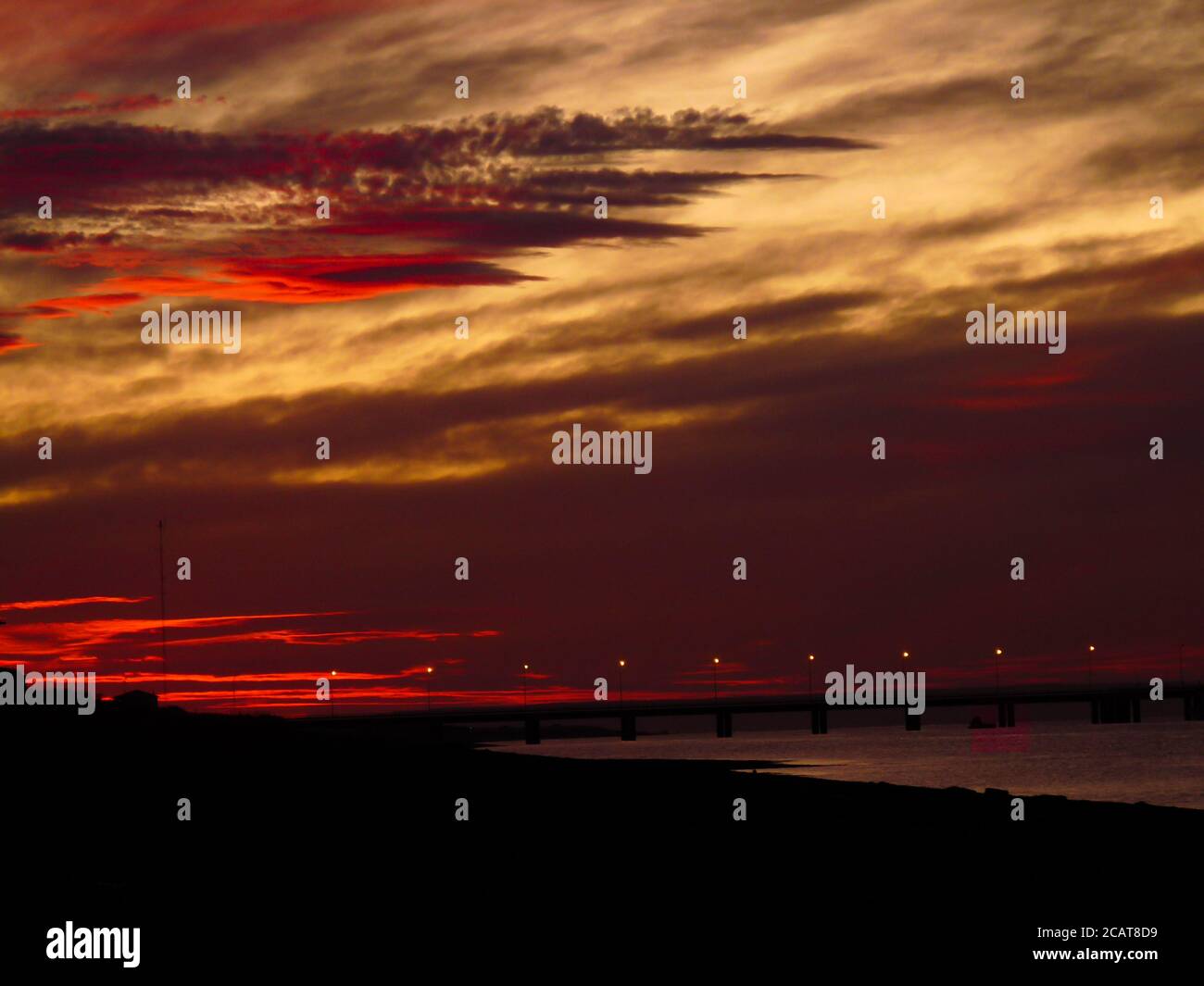 red sunset at the beach Stock Photo - Alamy