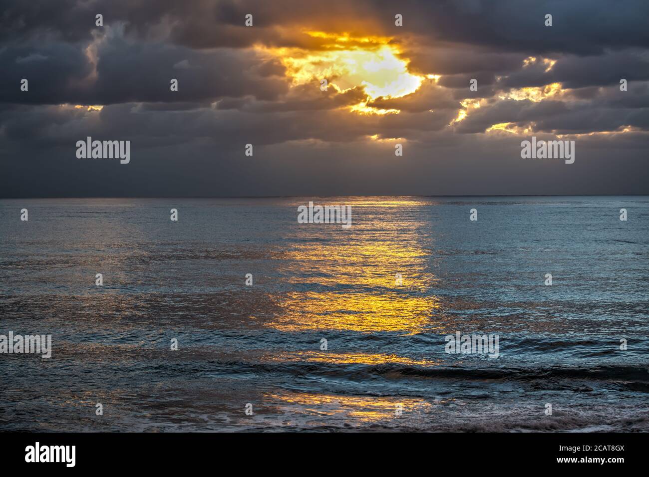 Grey sky over the sea in Alghero, Sardinia Stock Photo - Alamy