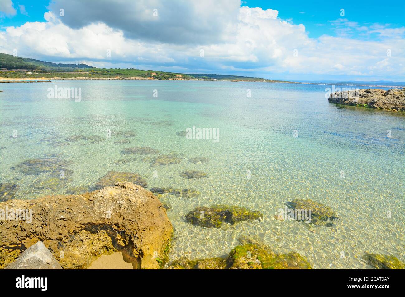 yellow rocks by the sea in Sardinia, Italy Stock Photo - Alamy