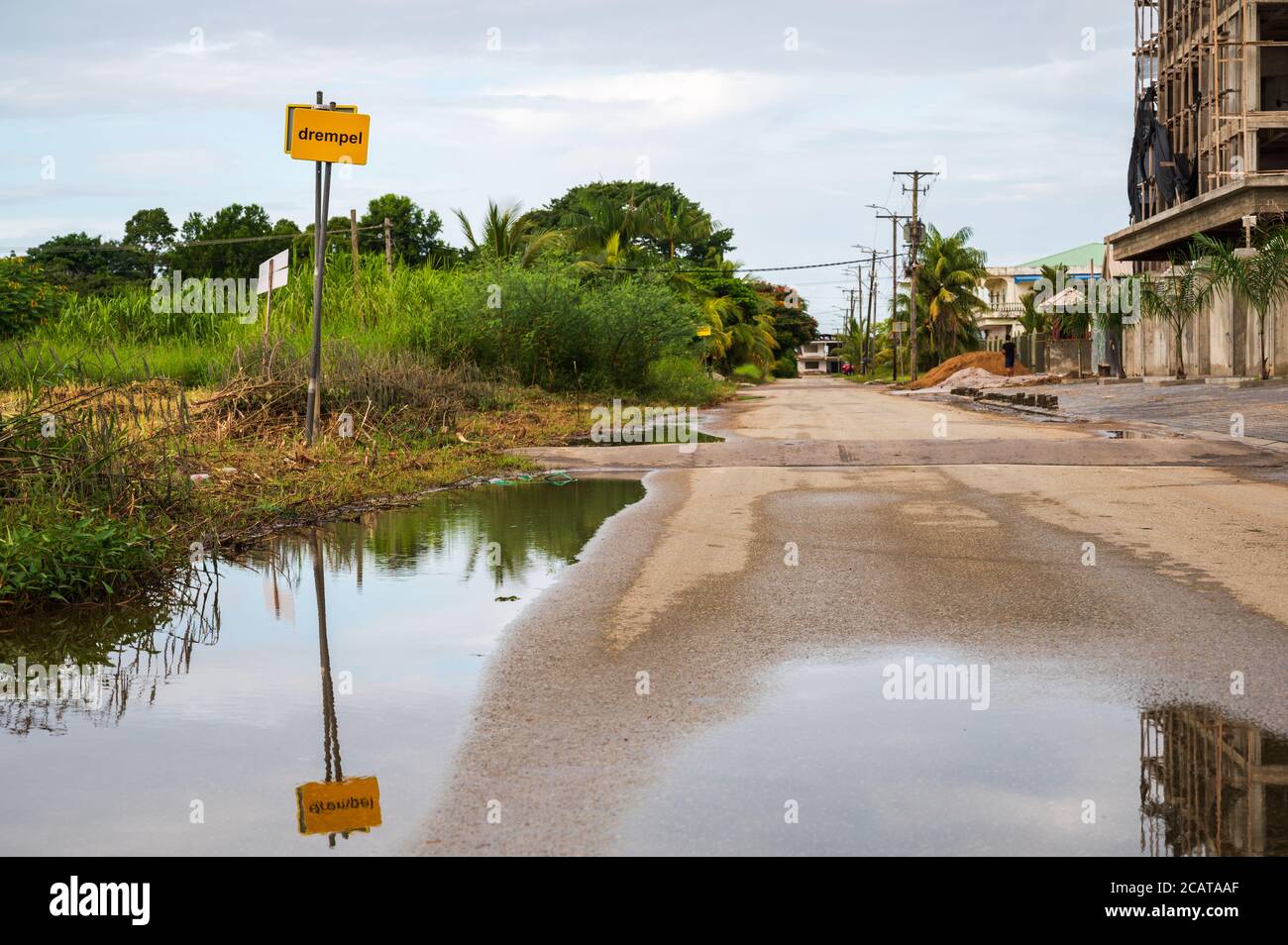 Canal in the northern suburb of capital city Paramaribo in Suriname ...