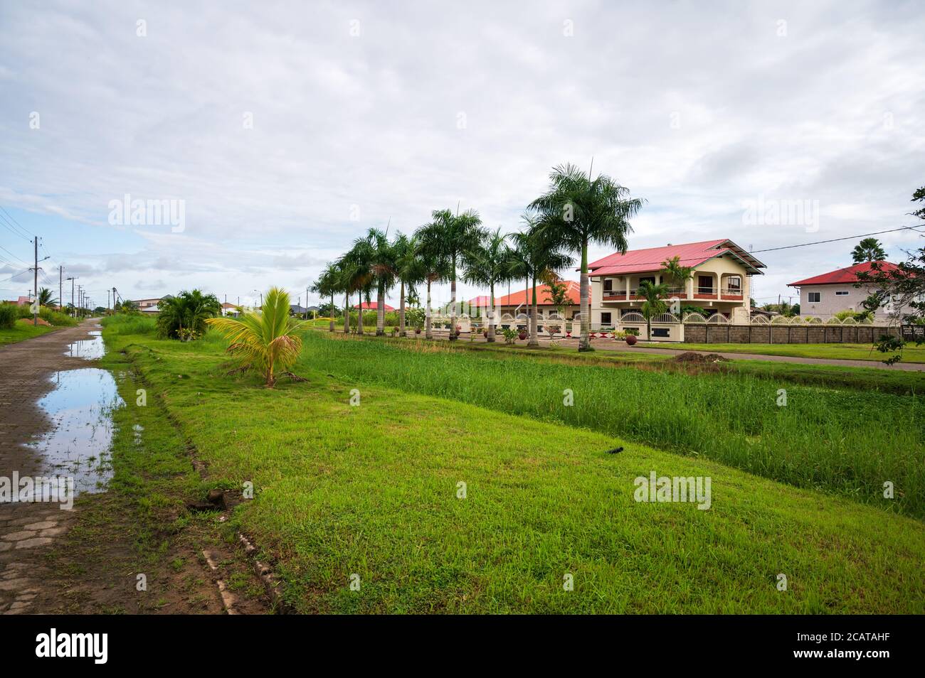 Canal in the northern suburb of capital city Paramaribo in Suriname ...