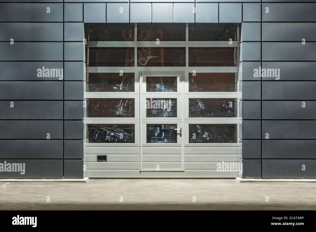 Exterior of the auto service building at night time Stock Photo - Alamy