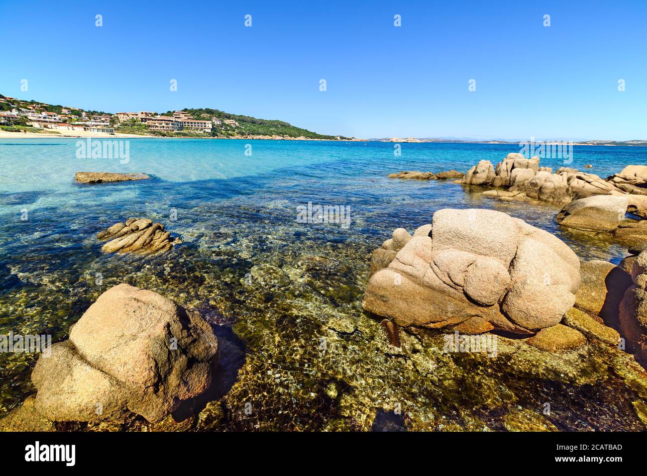 rocks and turquoise water in Cala Battistoni, Sardinia Stock Photo - Alamy