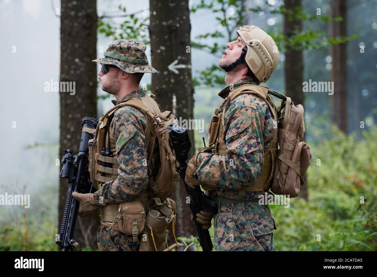 soldiers squad relaxed walking after battle Stock Photo - Alamy