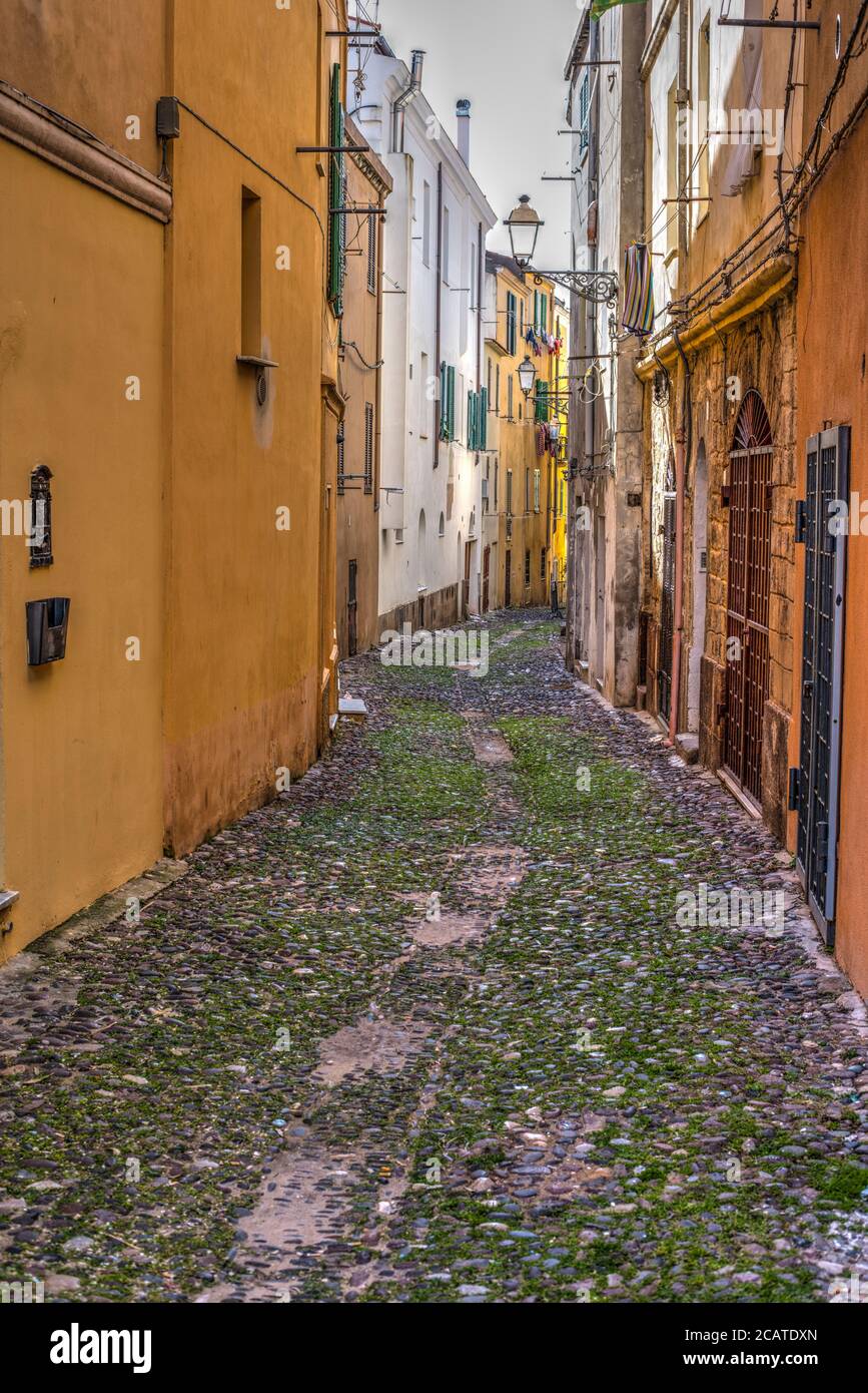 small street in Alghero old town, Italy Stock Photo - Alamy