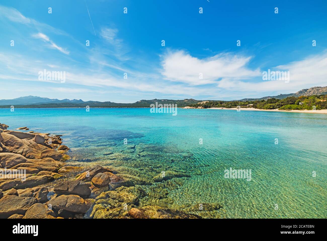 La Celvia beach under a blue sky, Sardinia Stock Photo - Alamy