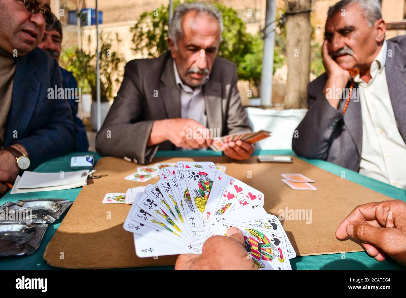 Group old men playing cards hi-res stock photography and images - Alamy