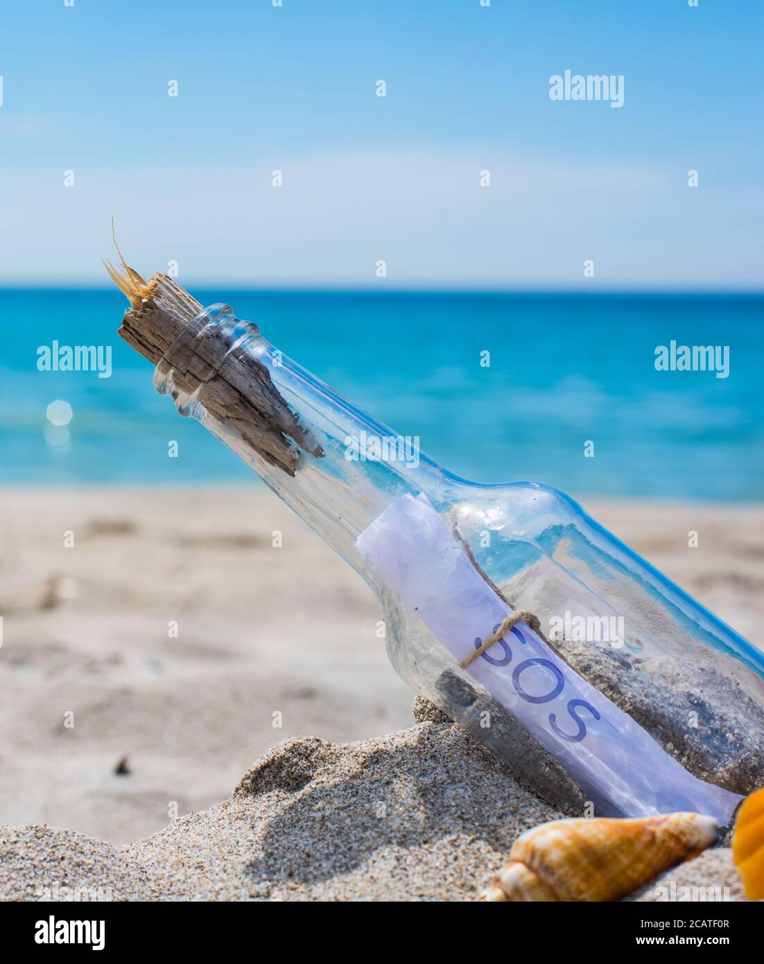Sos written in the sand hi-res stock photography and images - Alamy