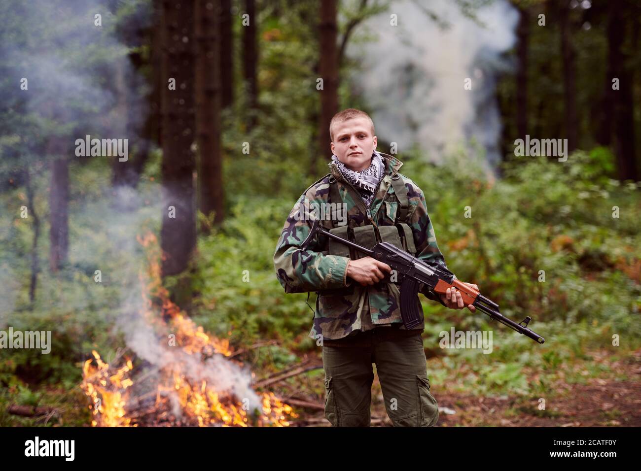 angry terrorist militant guerrilla soldier warrior in forest Stock ...