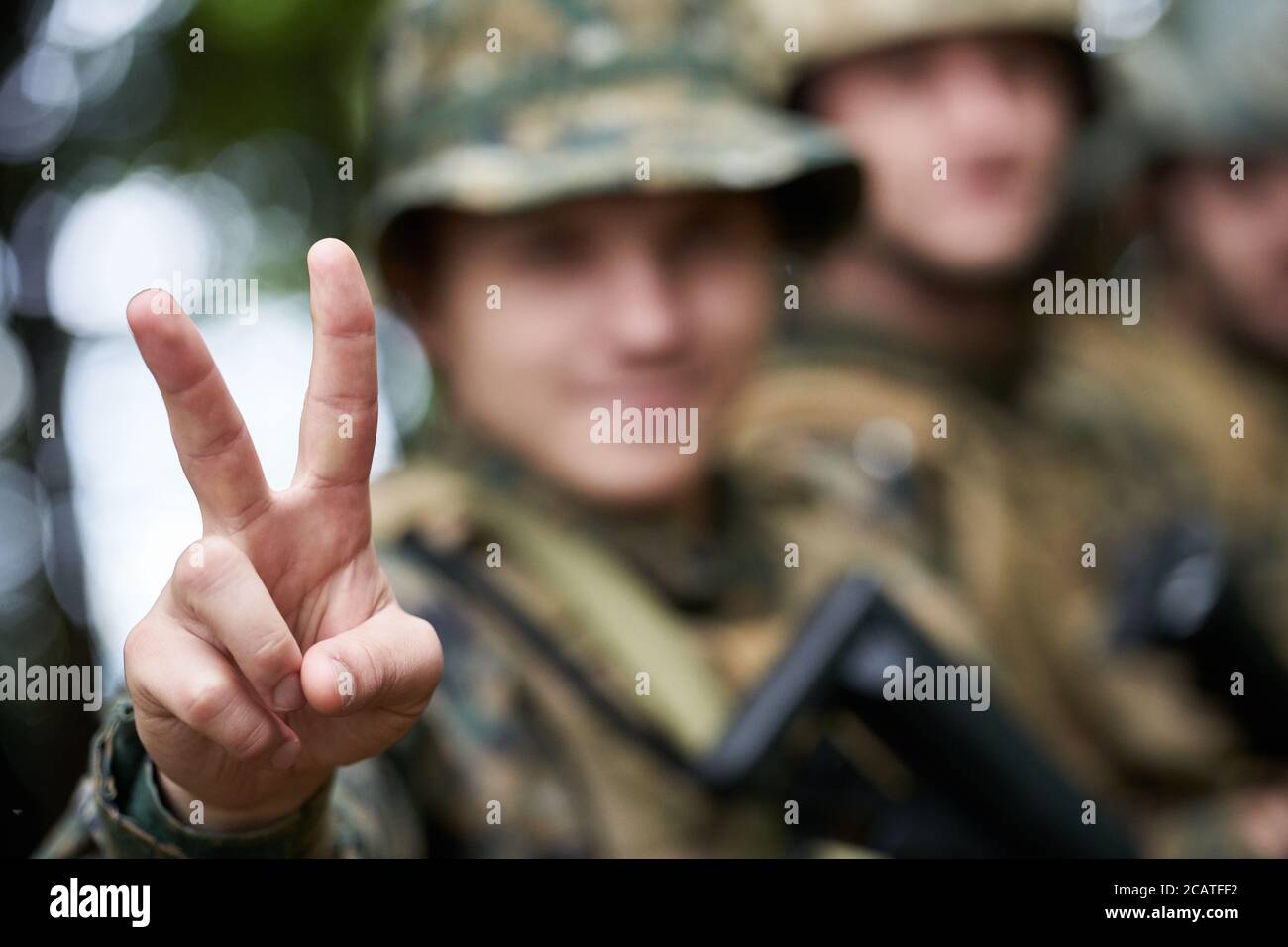 soldiers squad relaxed walking after battle Stock Photo - Alamy