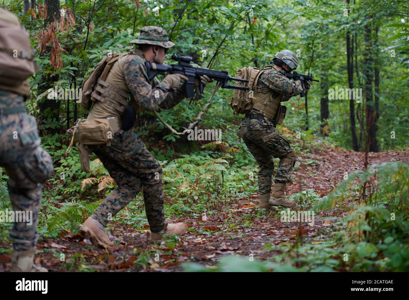 Modern warfare Soldiers Squad Running as Team in Battle Formation Stock ...