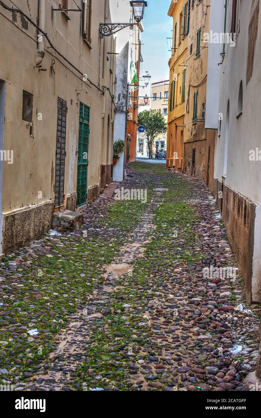 narrow street in Alghero old town, Sardinia Stock Photo - Alamy
