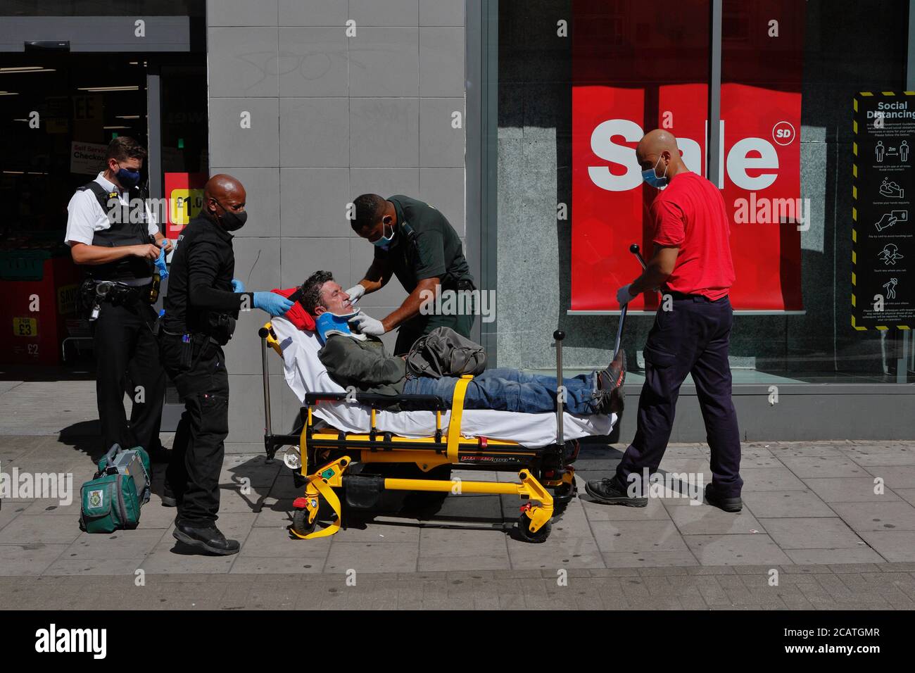 London (UK), August 7 2020: A man who has apparently collapsed on the ...