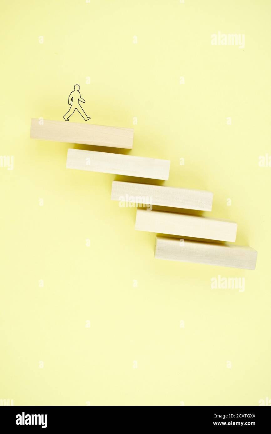 Wooden pegs forming a stairway Stock Photo - Alamy
