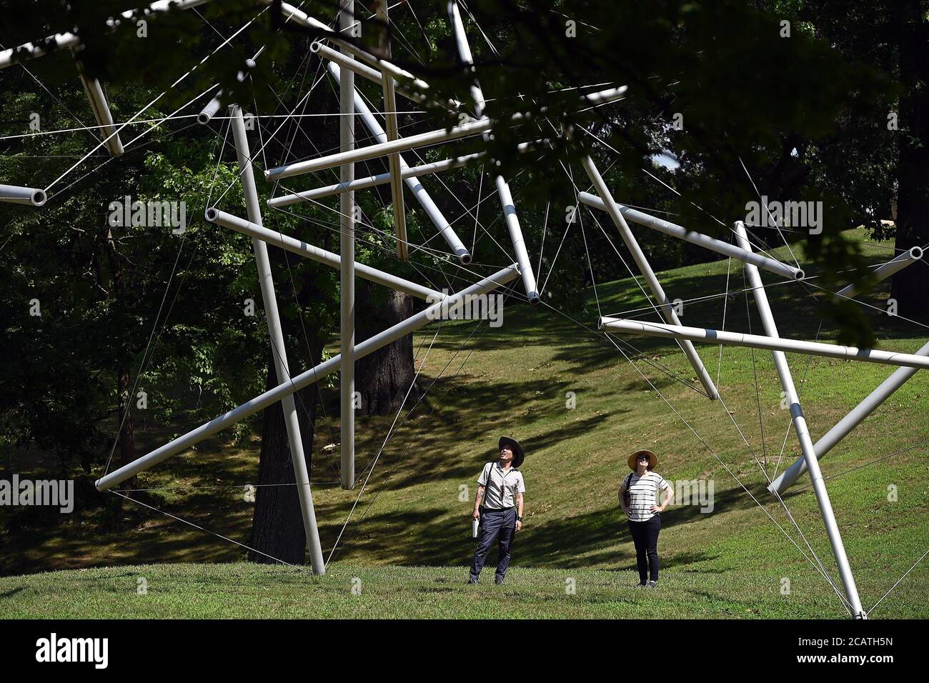 New York City, USA. 08th Aug, 2020. Two people stop to look at “Free ...