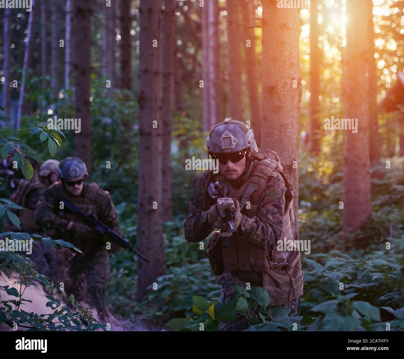 Modern warfare Soldiers Squad Running as Team in Battle Formation Stock ...