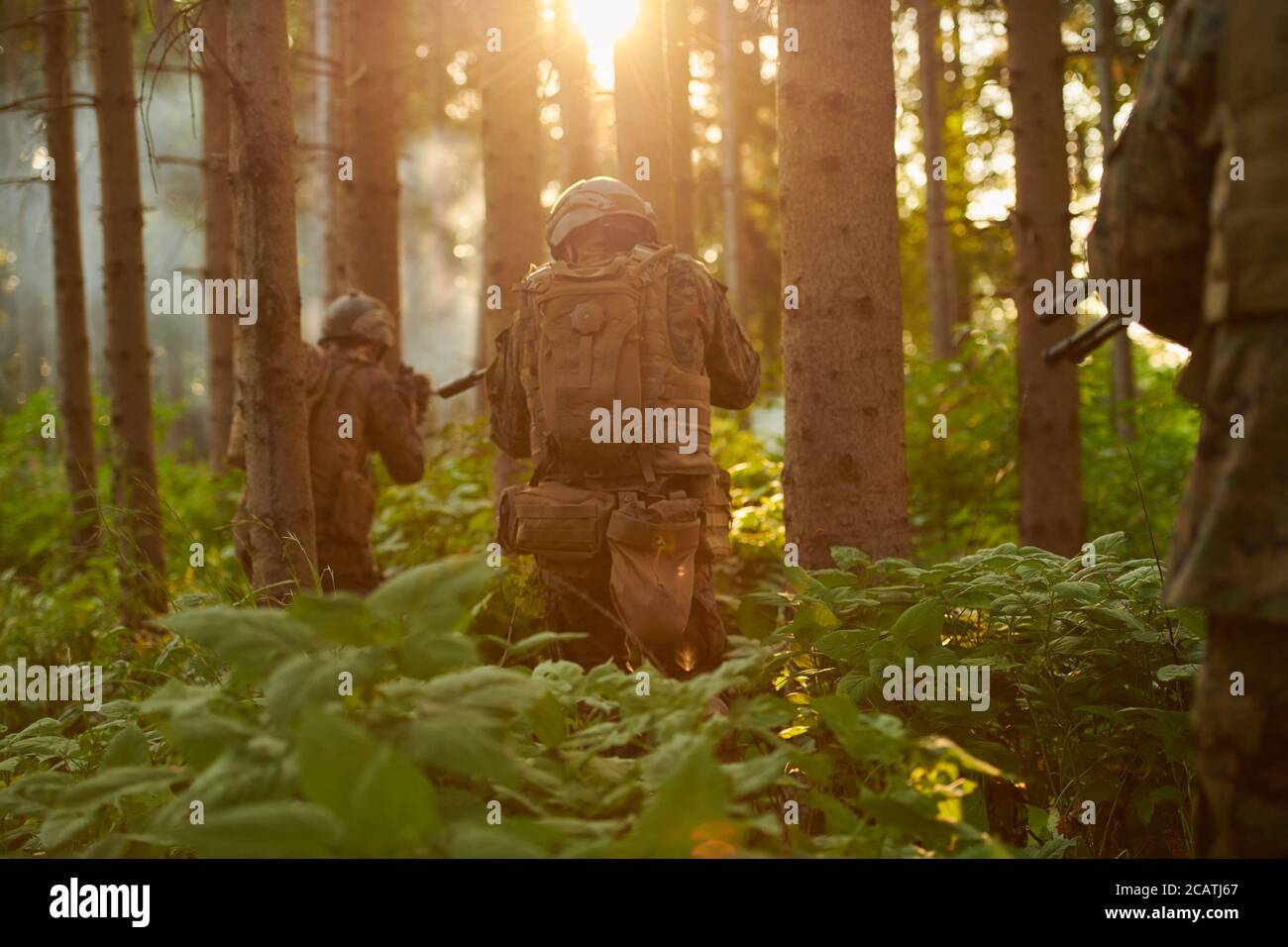 Modern warfare Soldiers Squad Running as Team in Battle Formation Stock ...