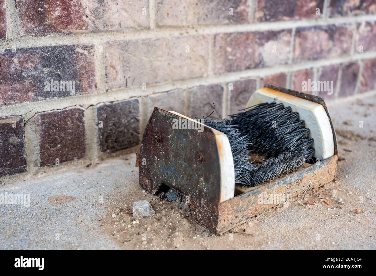 Tool used to remove dirt, dust, and mud from footwear Stock Photo - Alamy