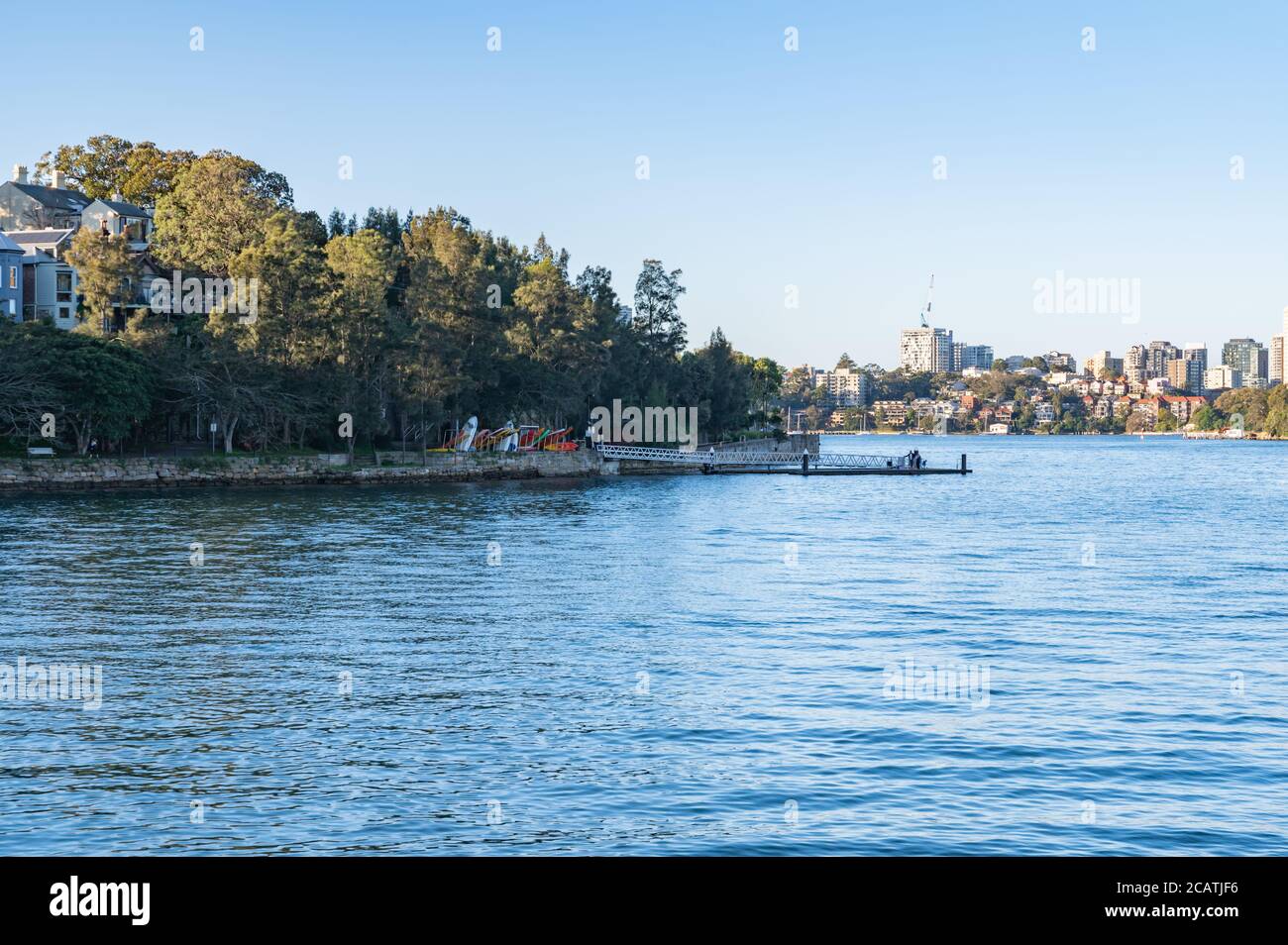 View of Sydney Harbour Blue Water and National Park background blur on a sunny winter afternoon ...