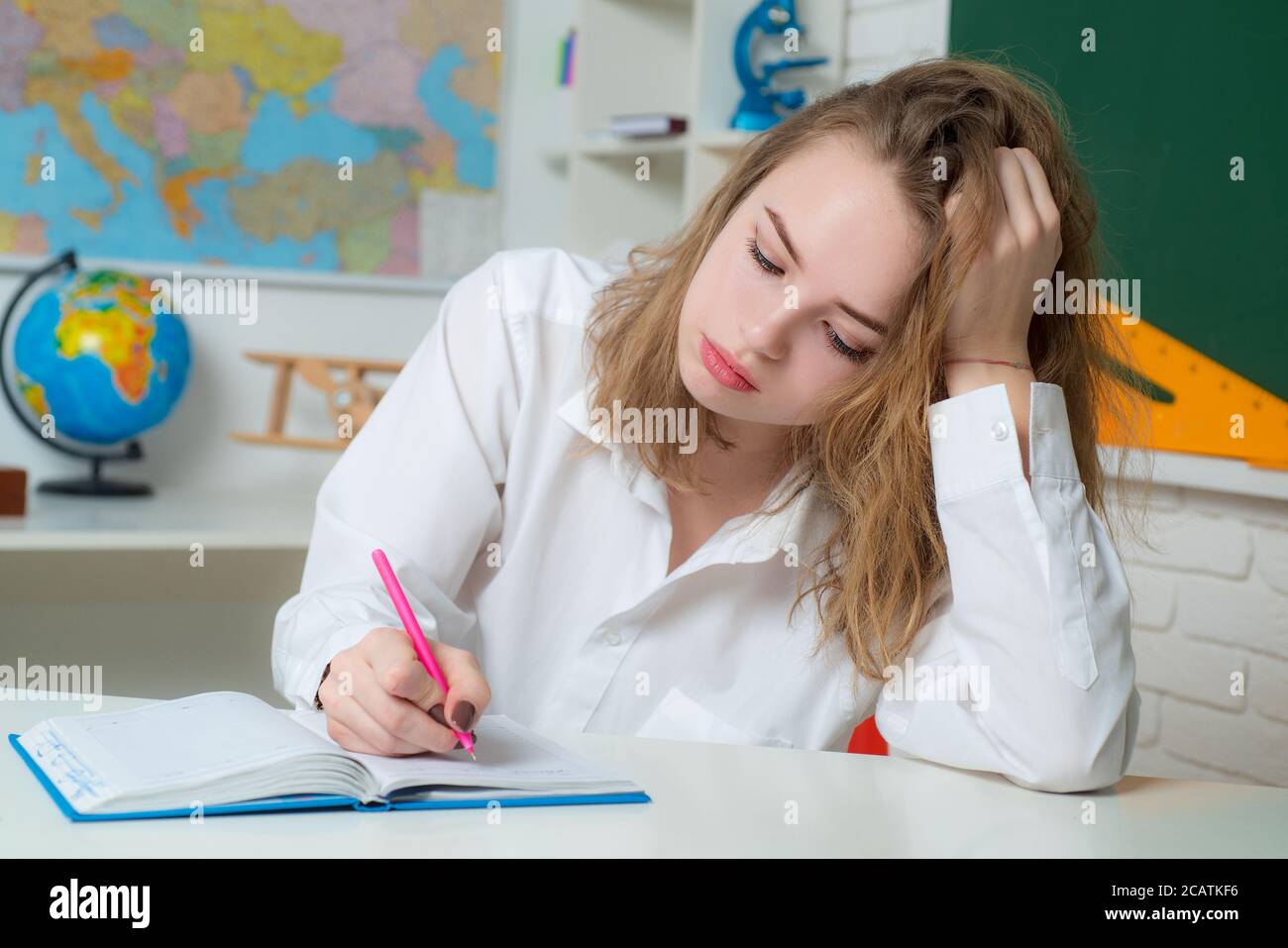 Elementary school student taking notes hi-res stock photography and ...