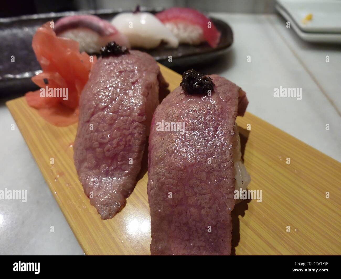 Close up shot of fresh Japanese style Wagyu Sushi at Taipei, Taiwan ...