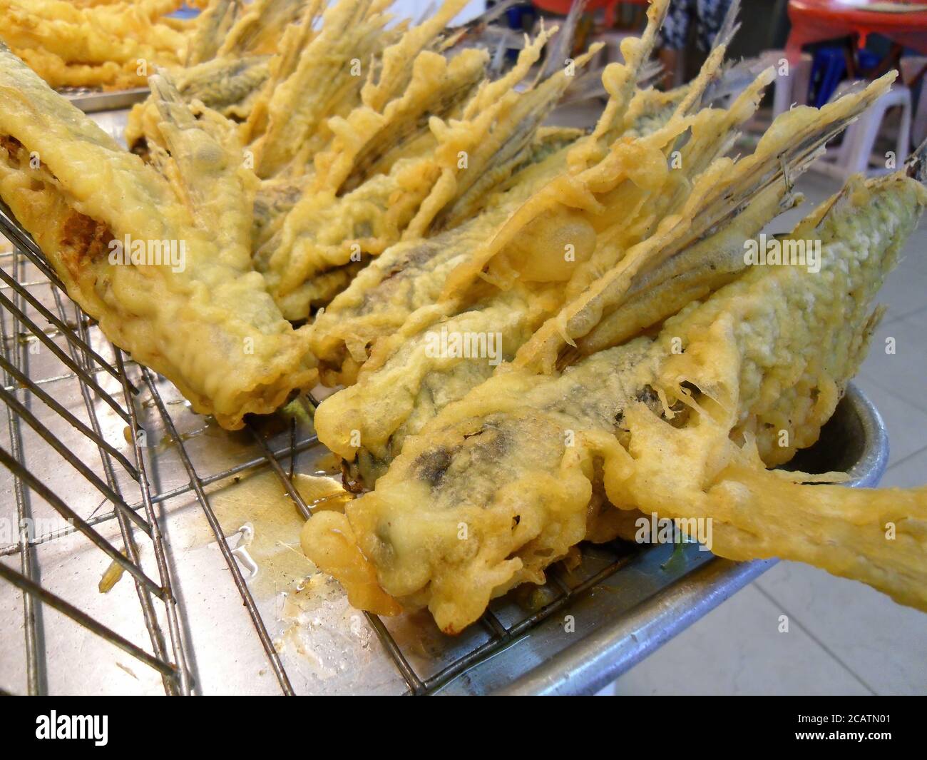 Fried flying fish hi-res stock photography and images - Alamy