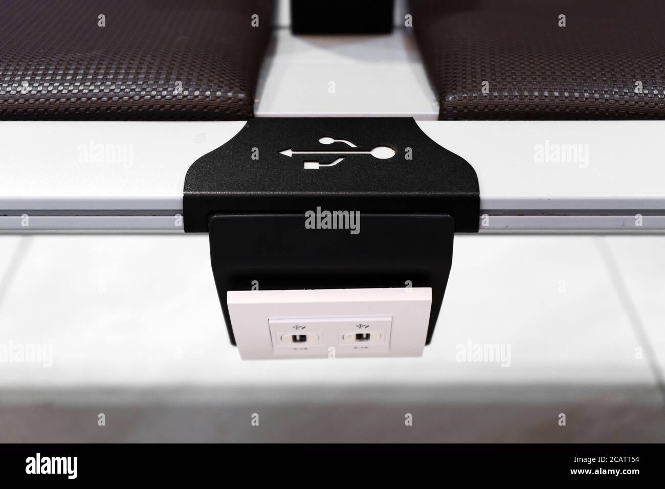USB sockets in the seats in the airport lounge Stock Photo - Alamy