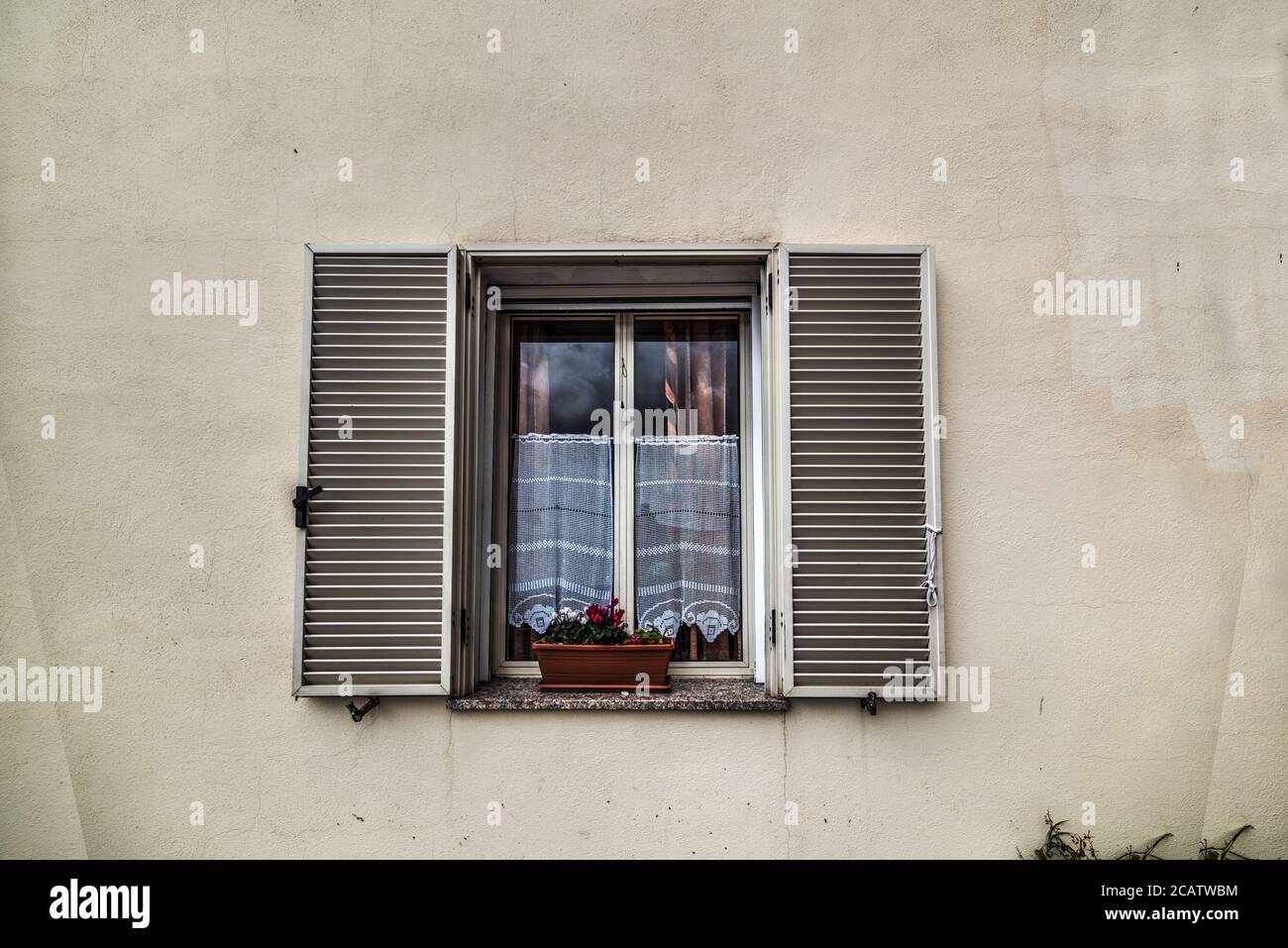 Rustic wall with open window Stock Photo - Alamy