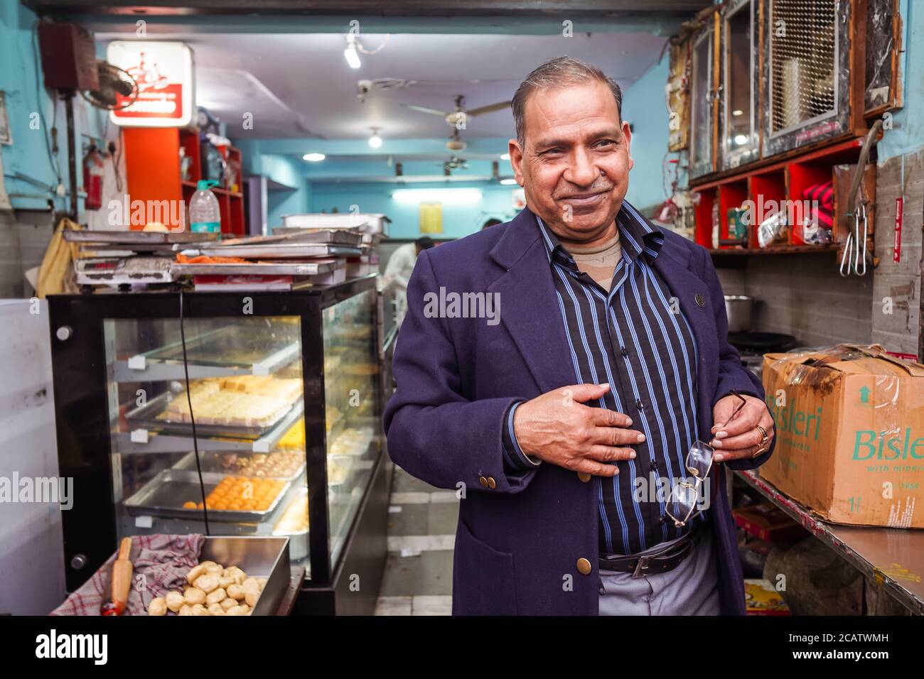 Agra / India - February 22, 2020: portrait of restaurant owner in ...