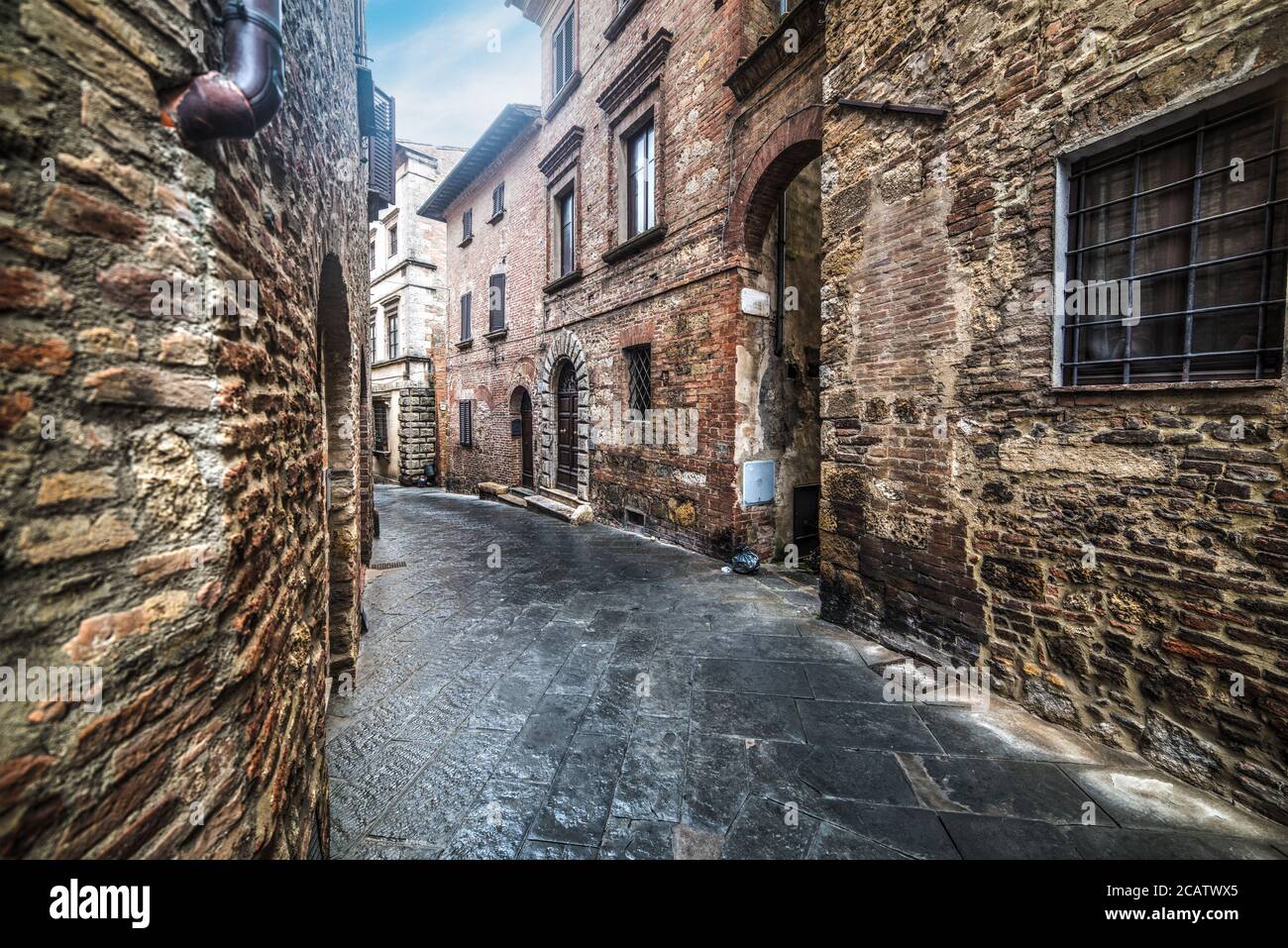 narrow alley in Montepulciano, Italy Stock Photo - Alamy