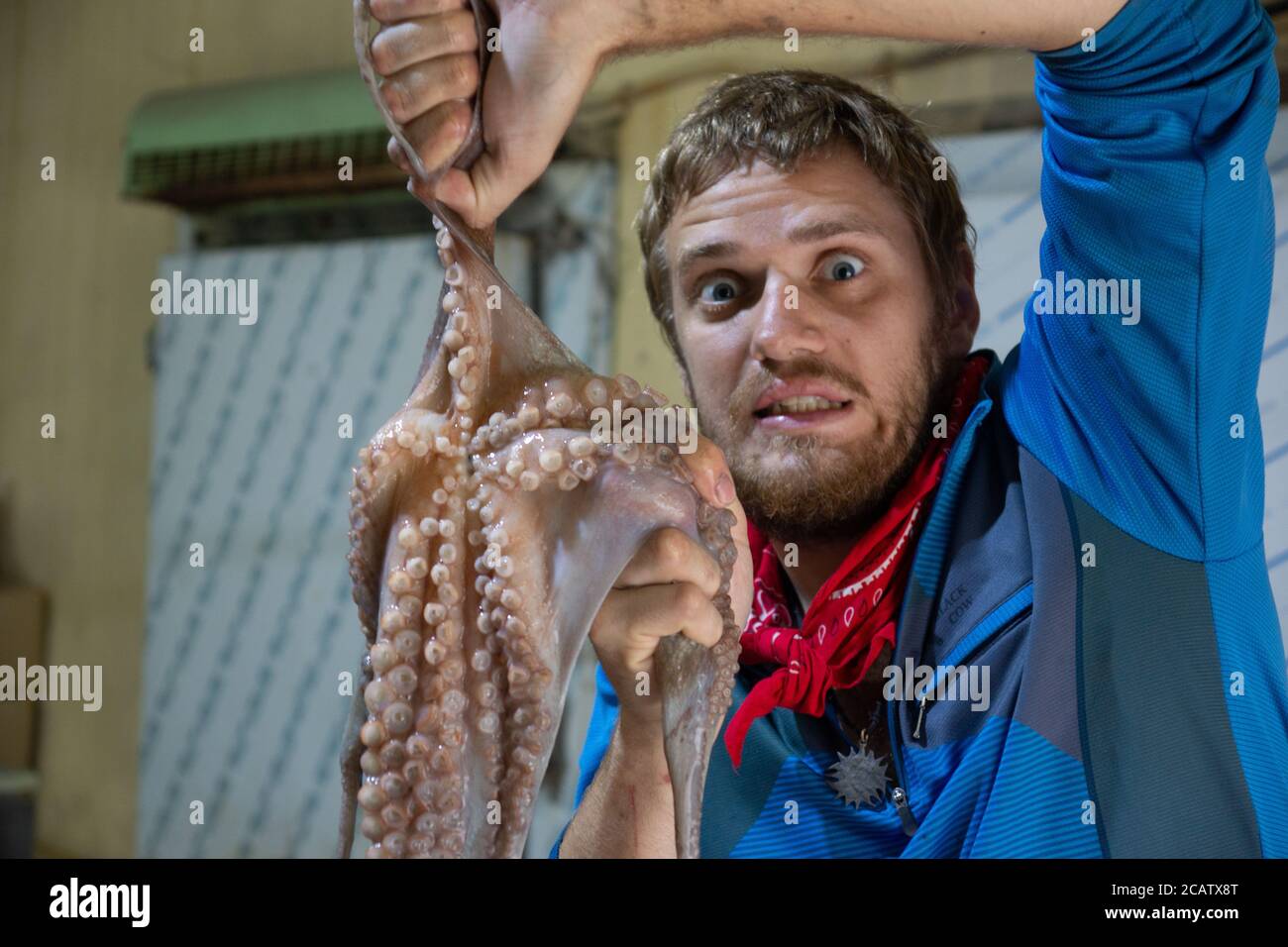 Man with octopus hi-res stock photography and images - Alamy
