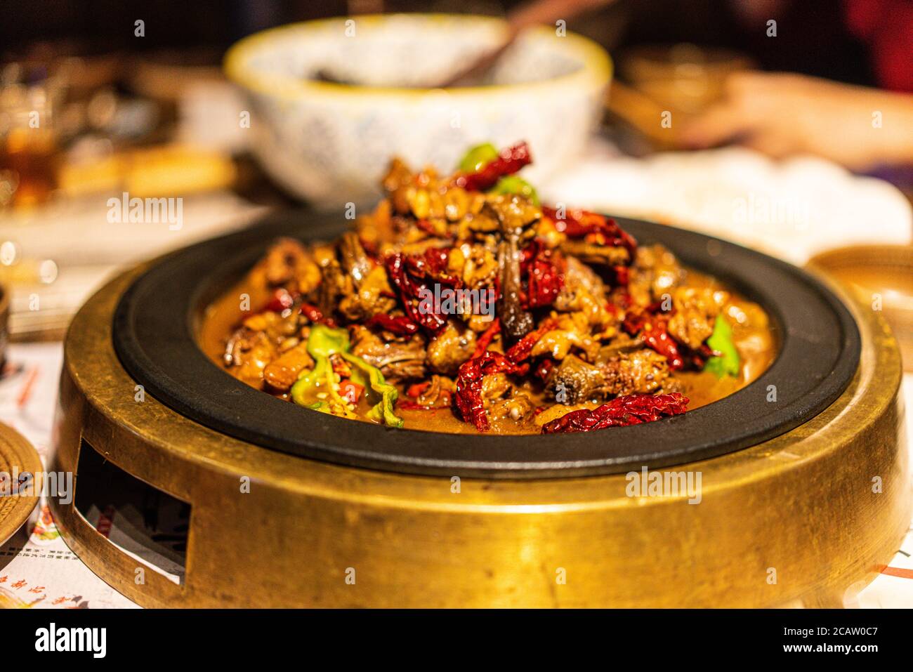 Chicken stew with mushrooms, traditional Xinjiang cuisine in China ...